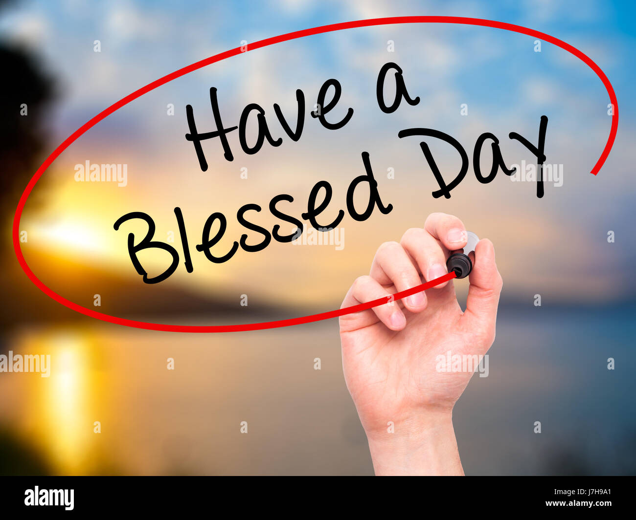Man Hand writing Have a Blessed Day with black marker on visual screen ...