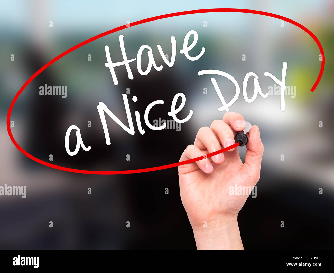 Man Hand writing Have a Nice Day with black marker on visual screen ...
