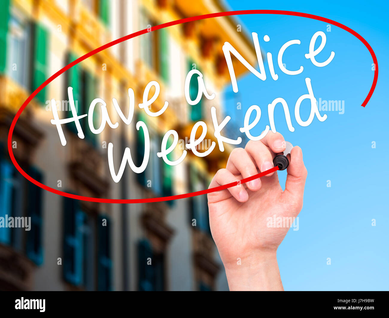 Man Hand writing Have a Nice Weekend with black marker on visual screen ...