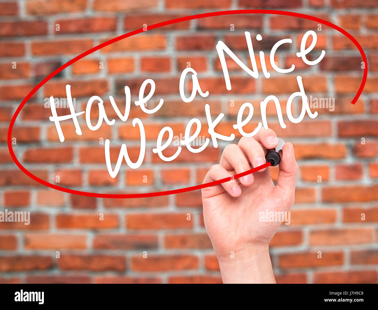 Man Hand writing Have a Nice Weekend with black marker on visual screen ...