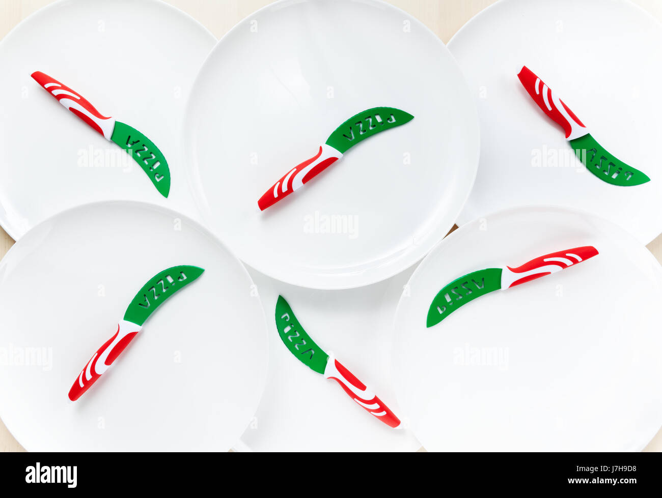 empty White plates with knives for pizza. Background for restaurants or ...