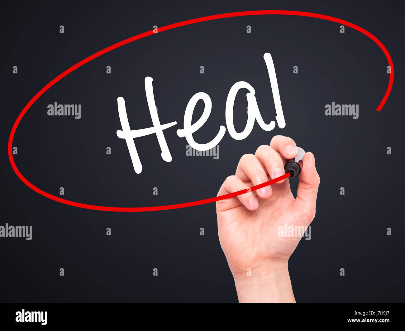 Man Hand writing Heal with black marker on visual screen. Isolated on ...