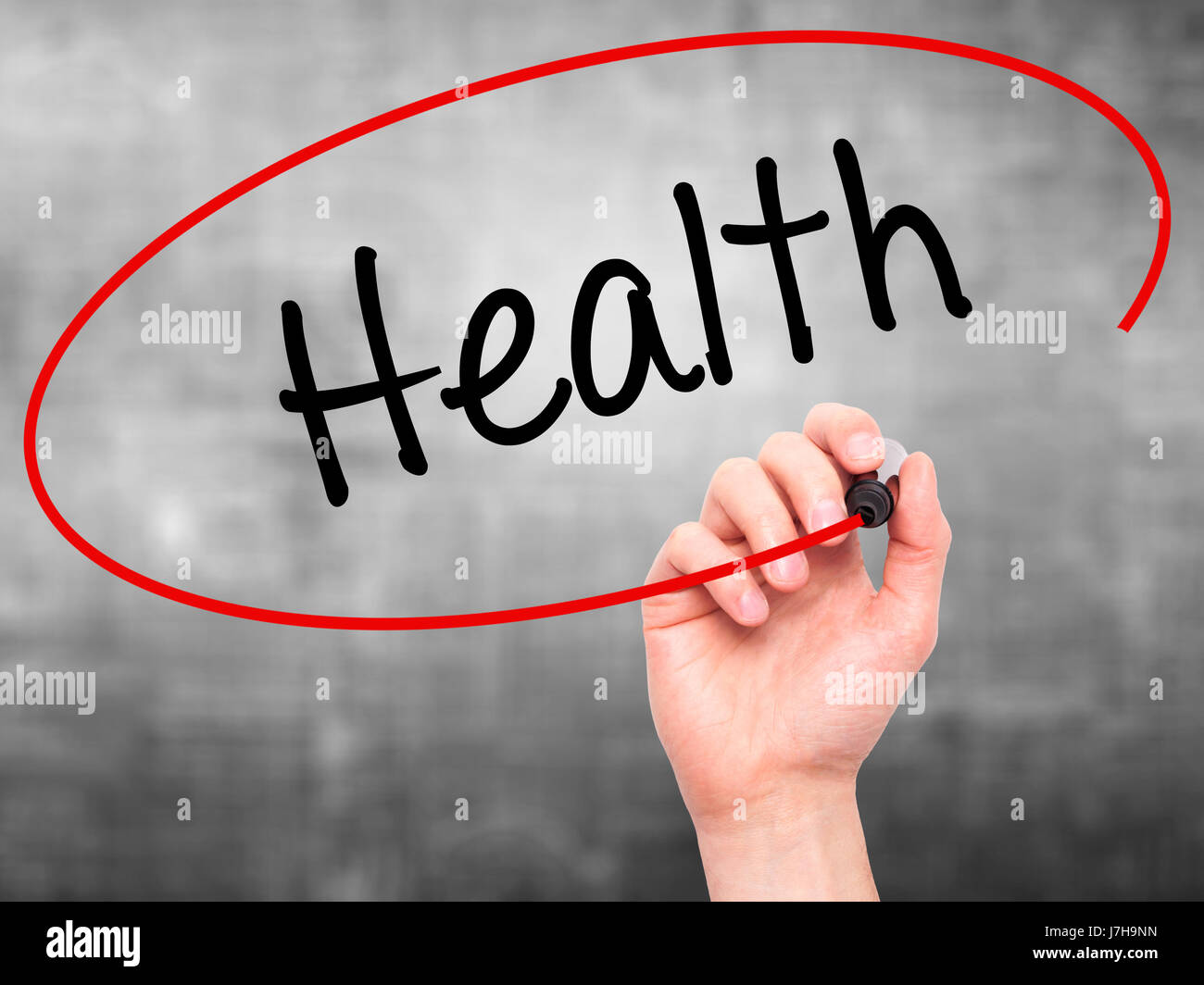 Man Hand writing Health with black marker on visual screen. Isolated on ...