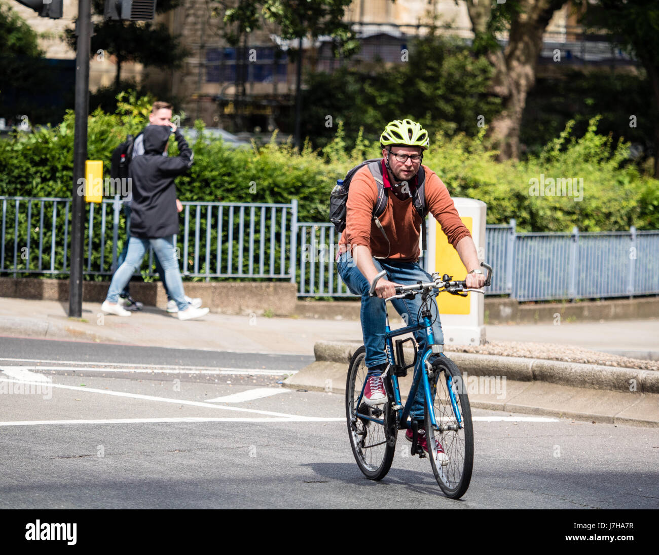London commuter cyclist, bike riding along London's urban roads Stock Photo - Alamy