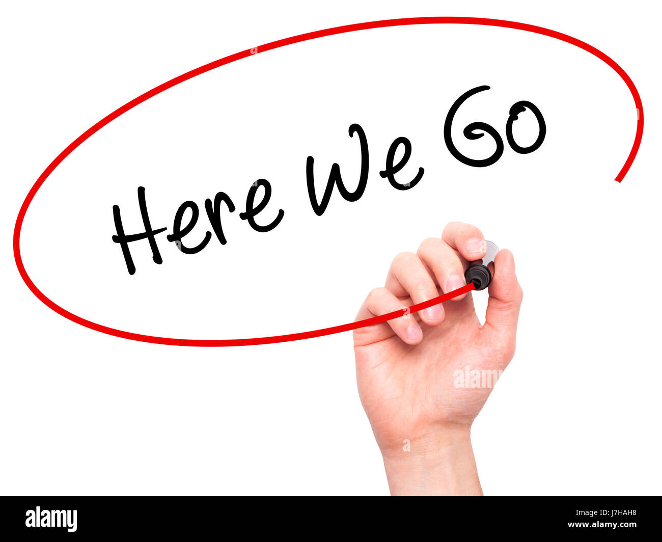 Man Hand writing Here We Go with black marker on visual screen ...