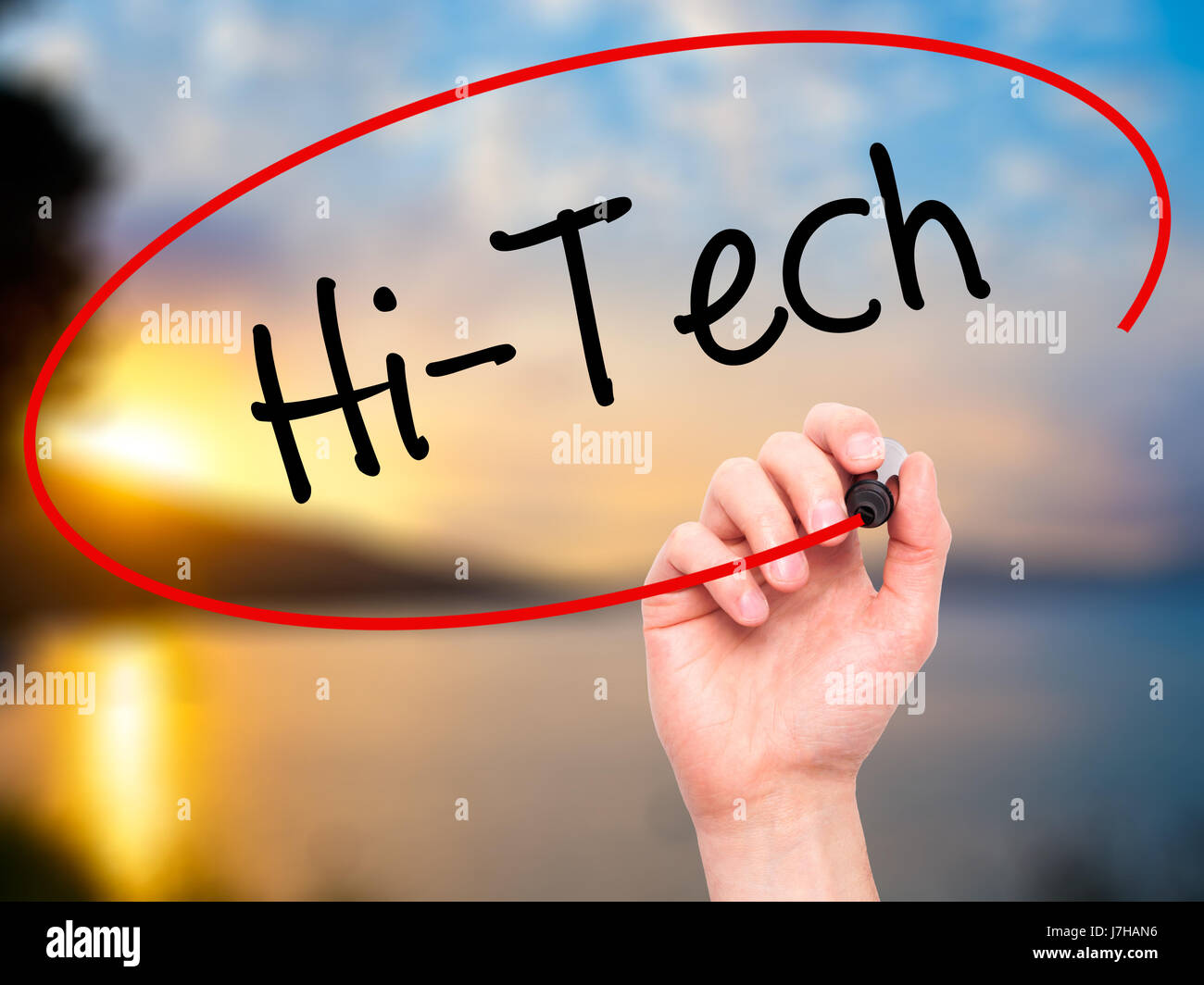 Man Hand writing Hi-Tech with black marker on visual screen. Isolated ...