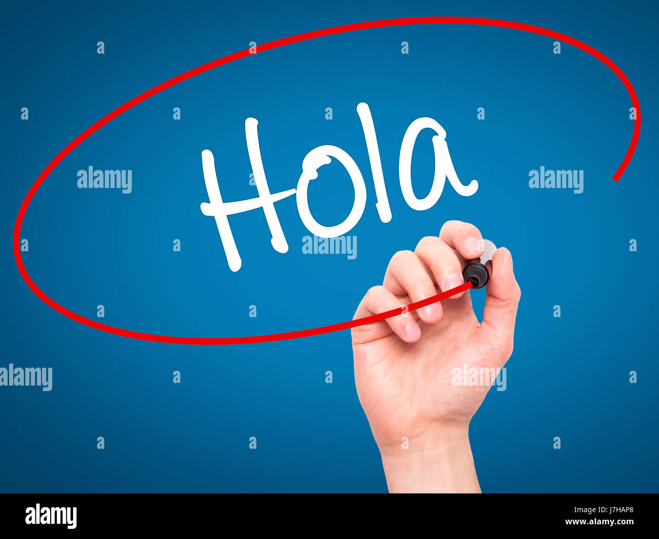 Man Hand writing Hola (Hello in Spanish) with black marker on visual ...