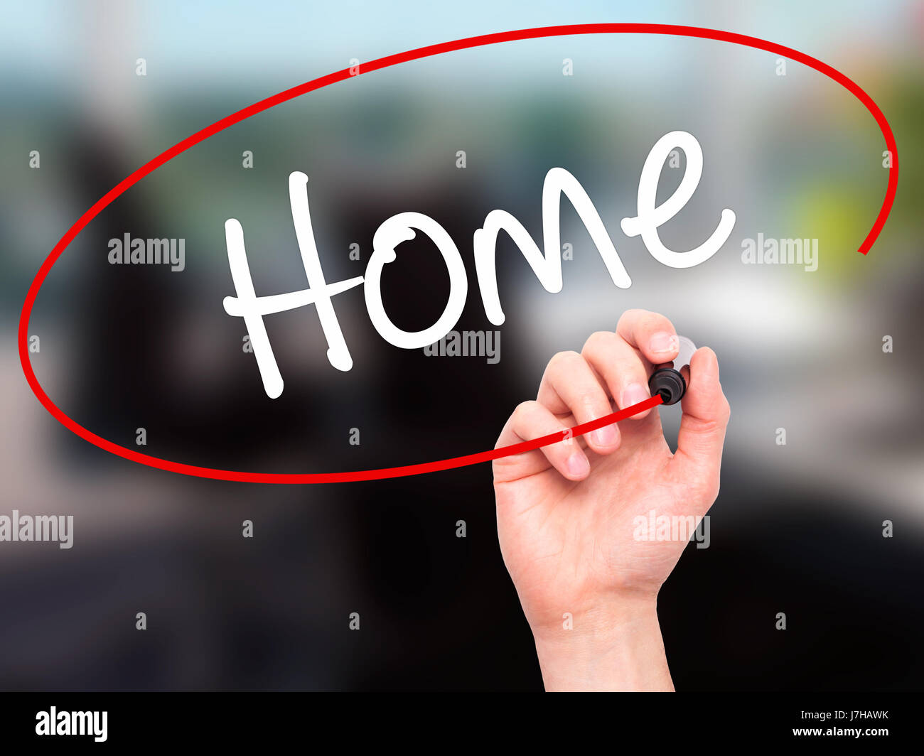 Man Hand writing Home with black marker on visual screen. Isolated on ...