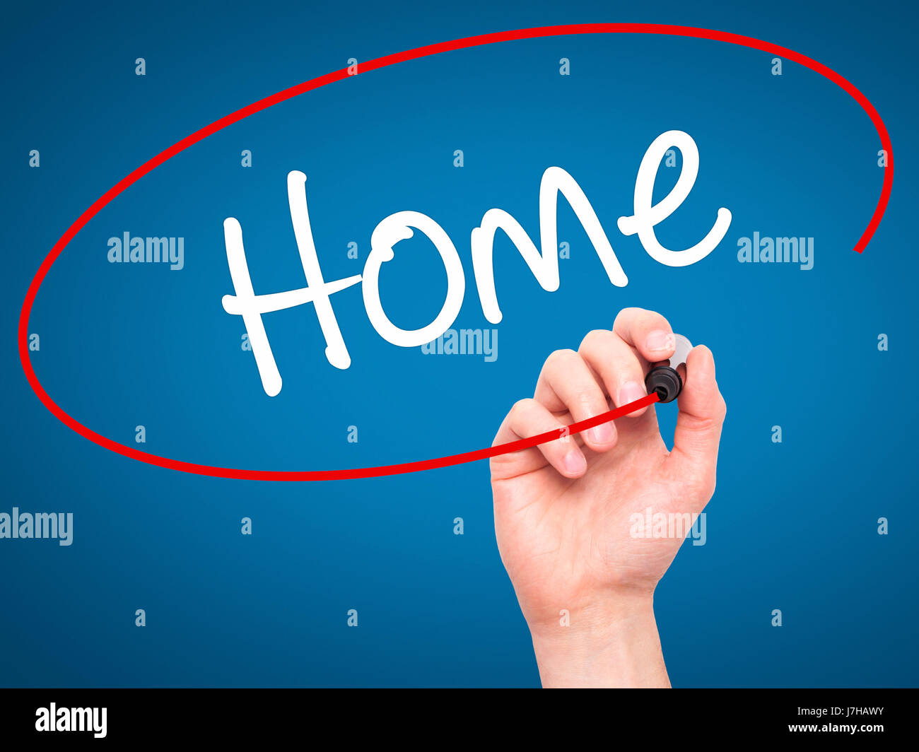Man Hand writing Home with black marker on visual screen. Isolated on ...