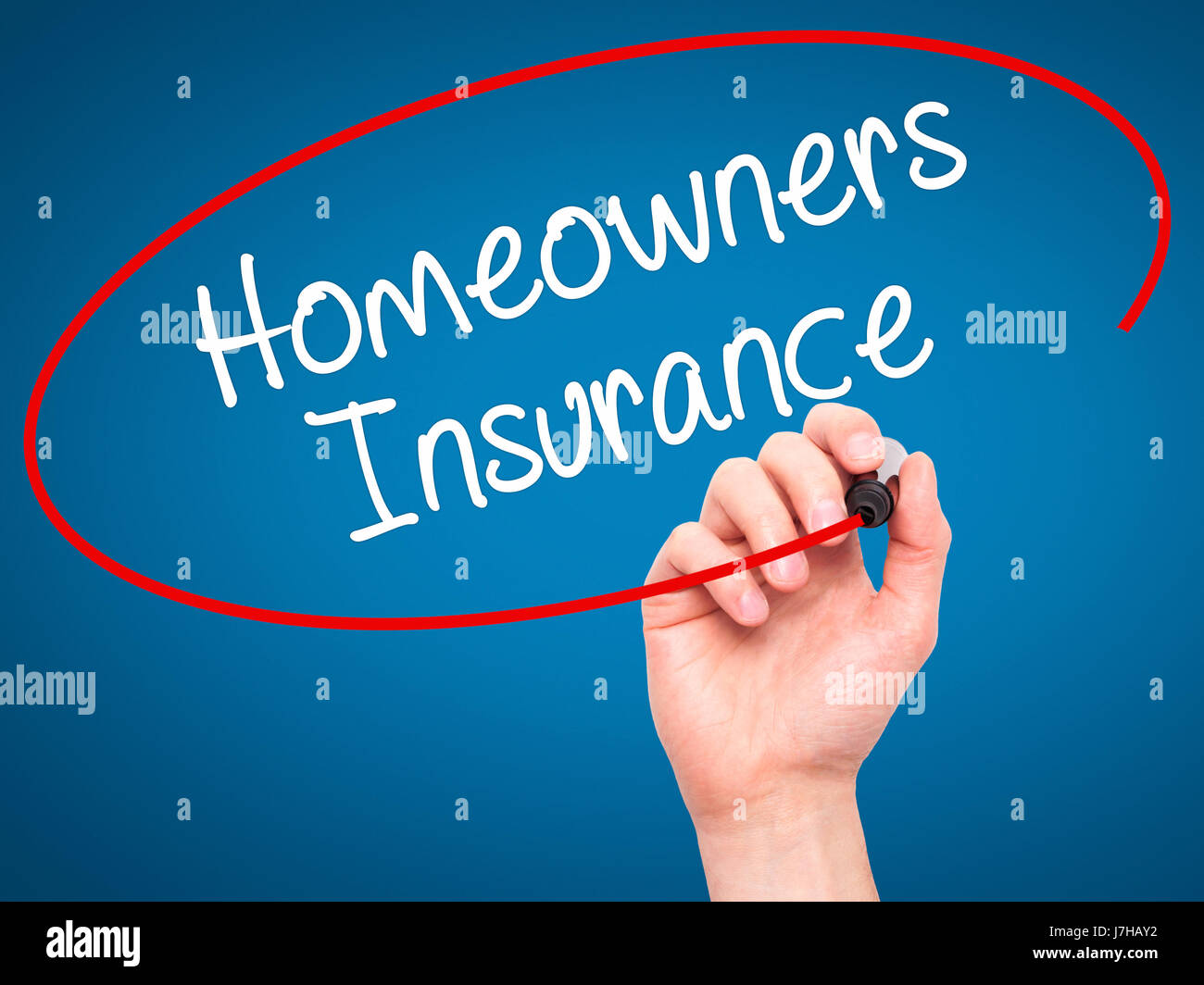 Man Hand writing Homeowners Insurance with black marker on visual ...