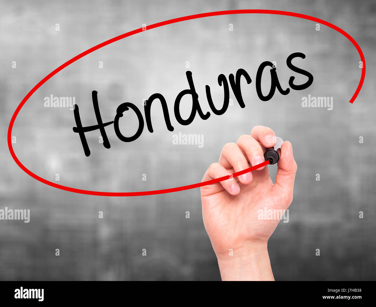 Man Hand writing Honduras with black marker on visual screen. Isolated ...