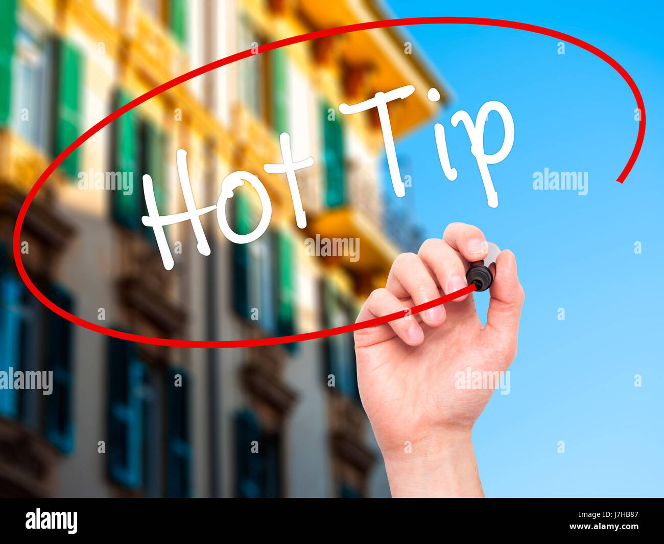 Man Hand writing Hot Tip with black marker on visual screen. Isolated ...
