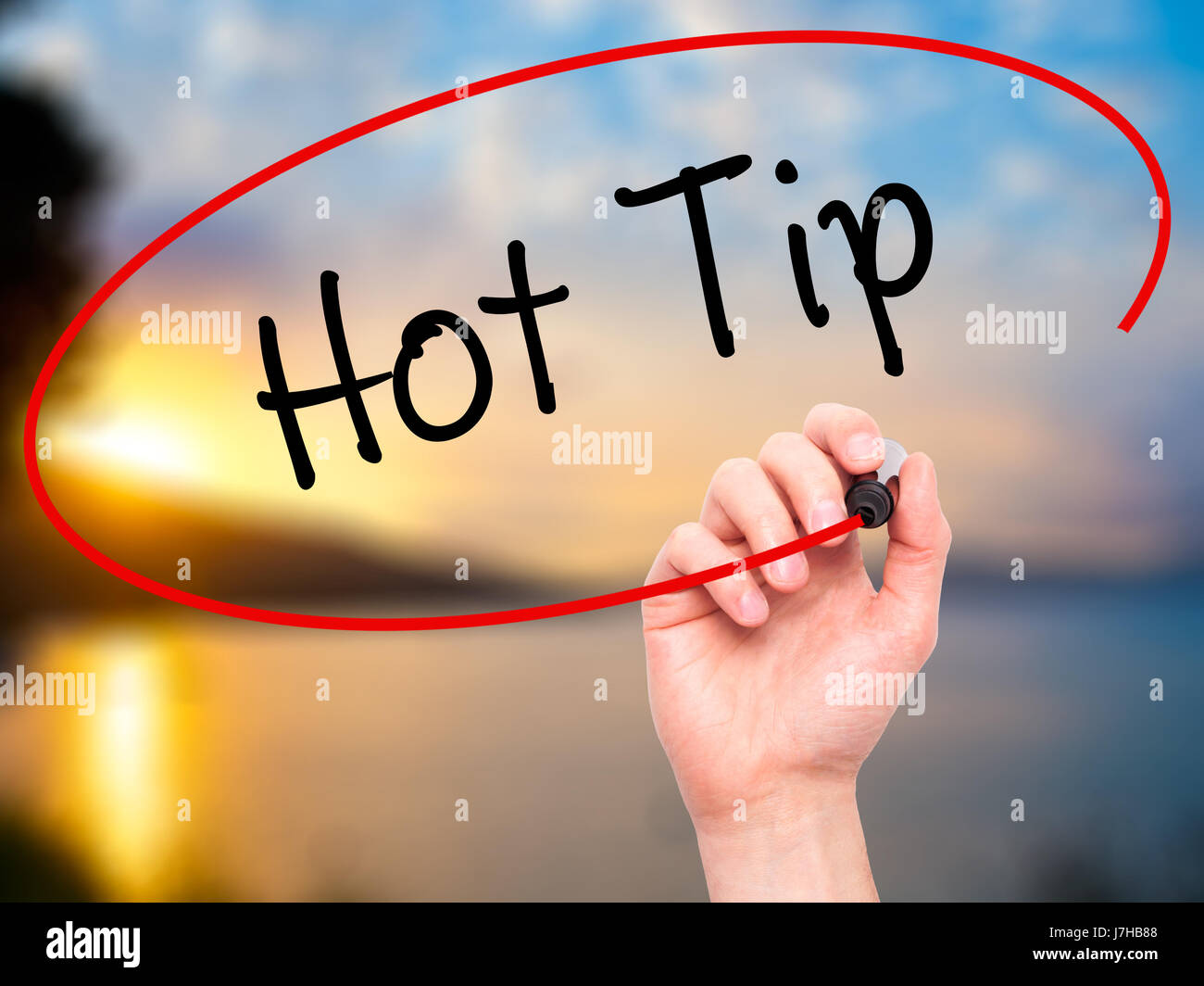 Man Hand writing Hot Tip with black marker on visual screen. Isolated ...