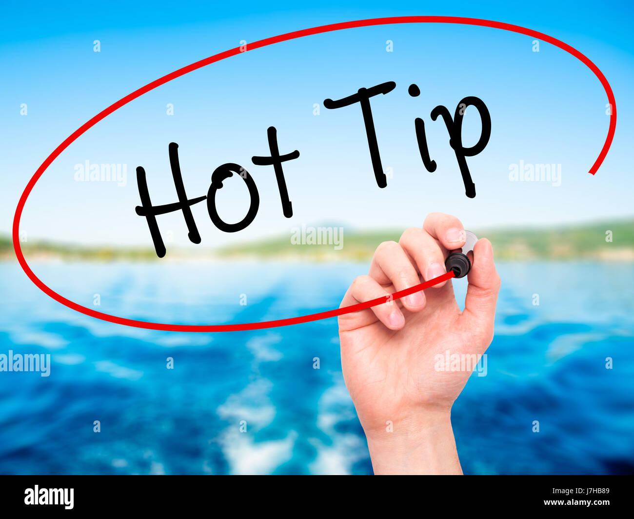 Man Hand writing Hot Tip with black marker on visual screen. Isolated ...