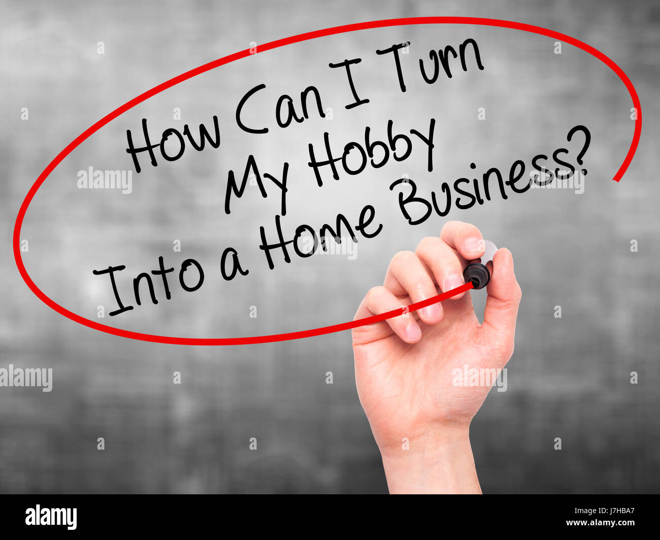Man Hand writing How Can I Turn My Hobby Into a Home Business? with ...