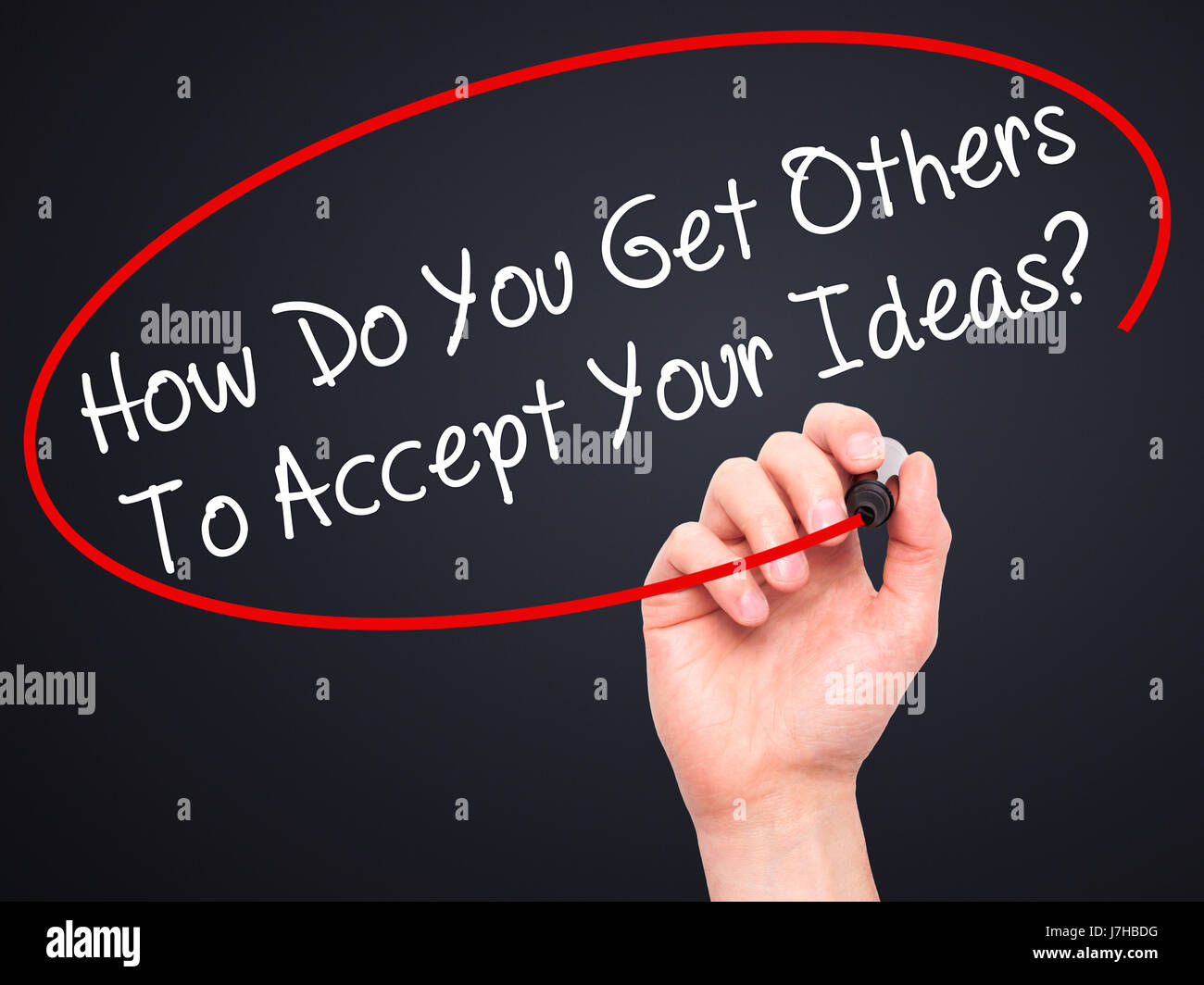 Man Hand writing How Do You Get Others To Accept Your Ideas? with black ...