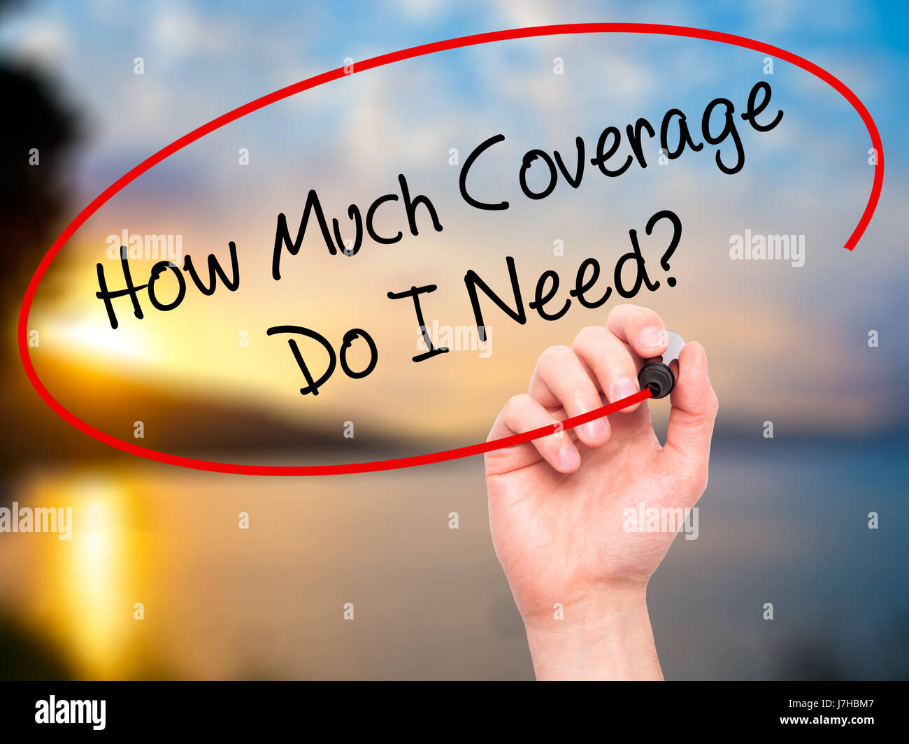 Man Hand writing How Much Coverage Do I Need? with black marker on visual screen. Isolated on ...