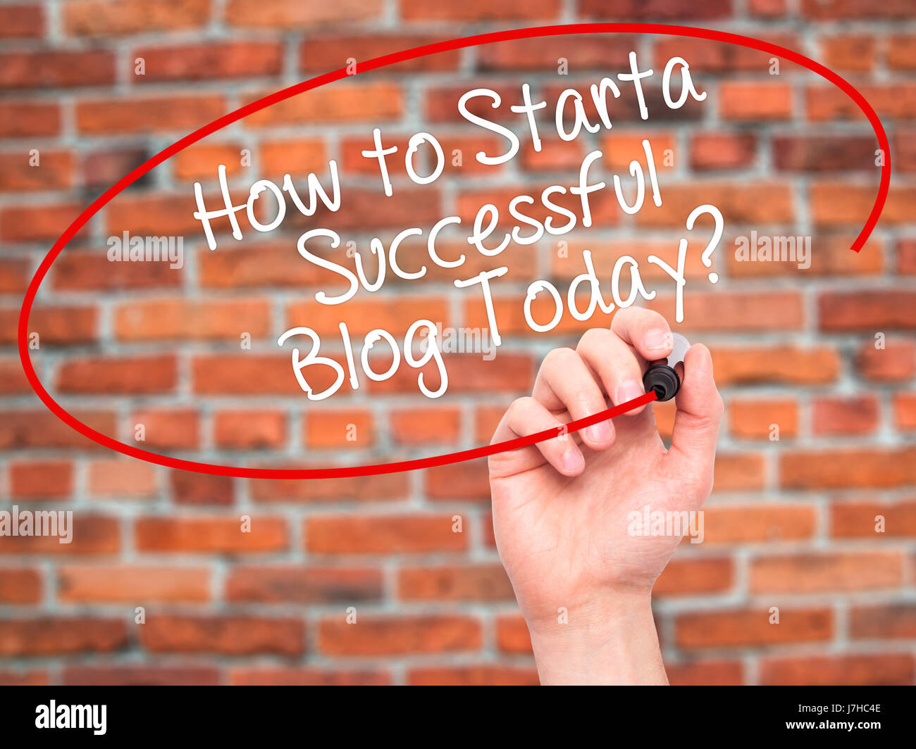 Man Hand writing How to Start a Successful Blog Today? with black ...