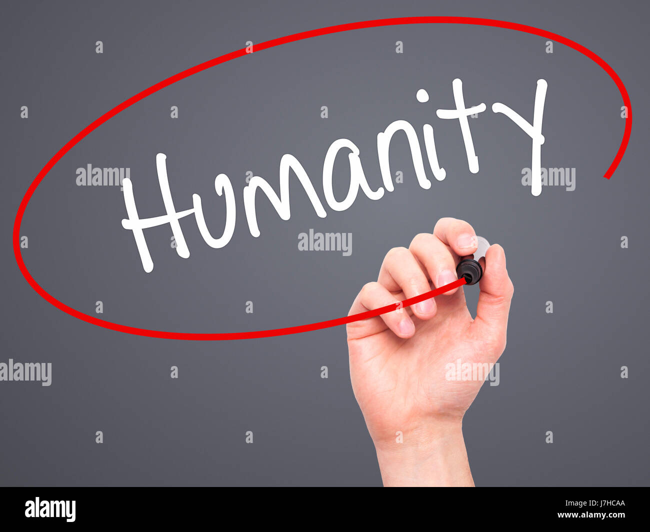 Man Hand writing Humanity with black marker on visual screen. Isolated ...