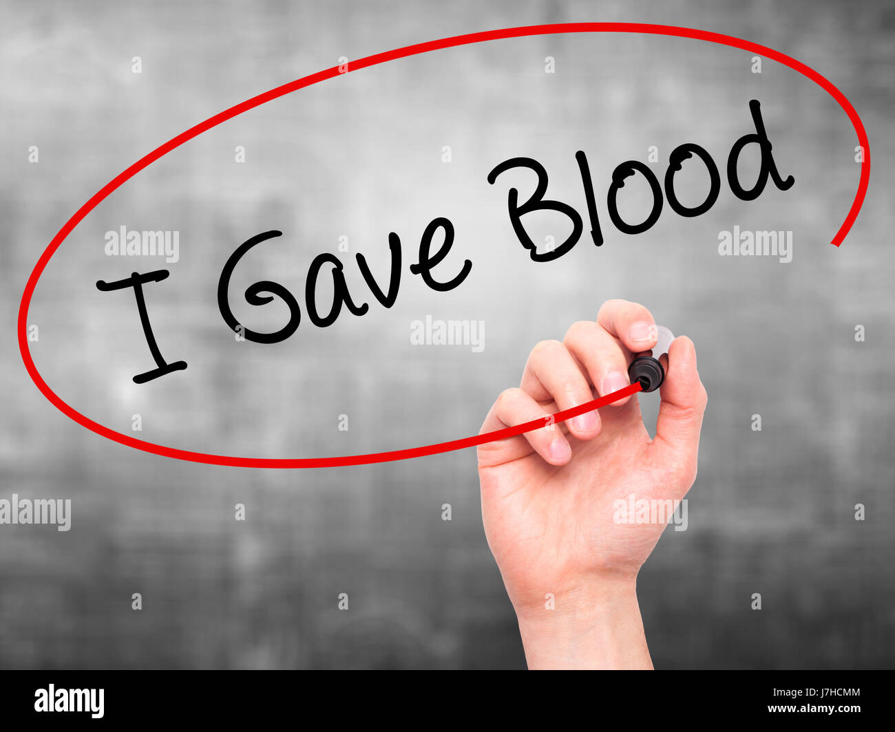 Man Hand writing I Gave Blood with black marker on visual screen ...