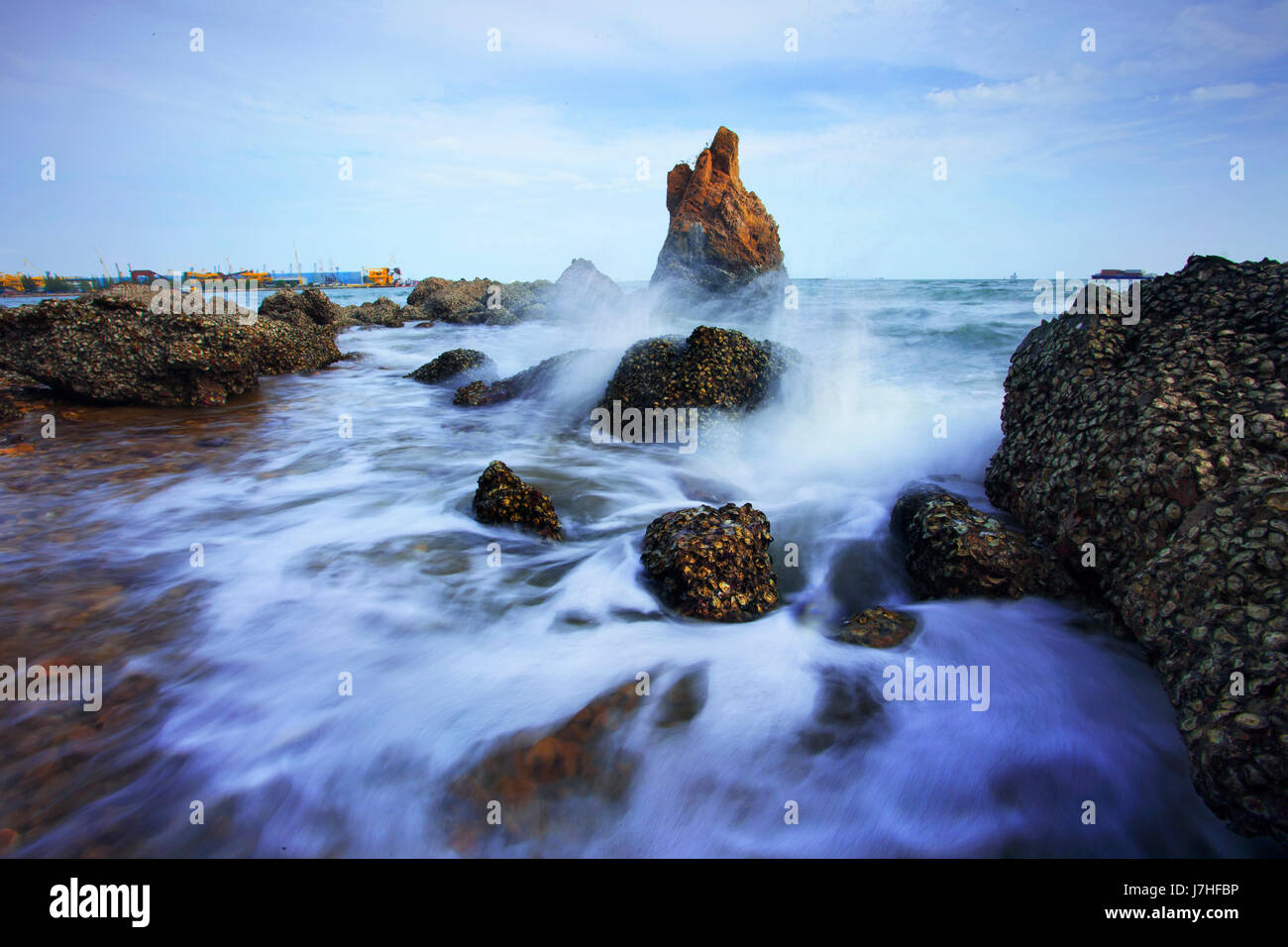beautiful sea scape of waves splashing on rock use for multipurpose ...