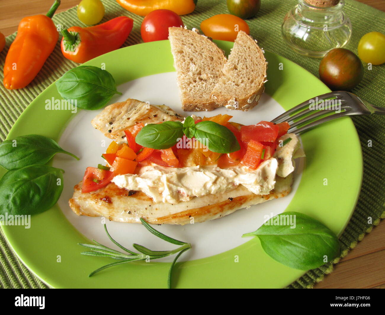 cream cheese and tomato & pepper salsa on turkey Stock Photo - Alamy