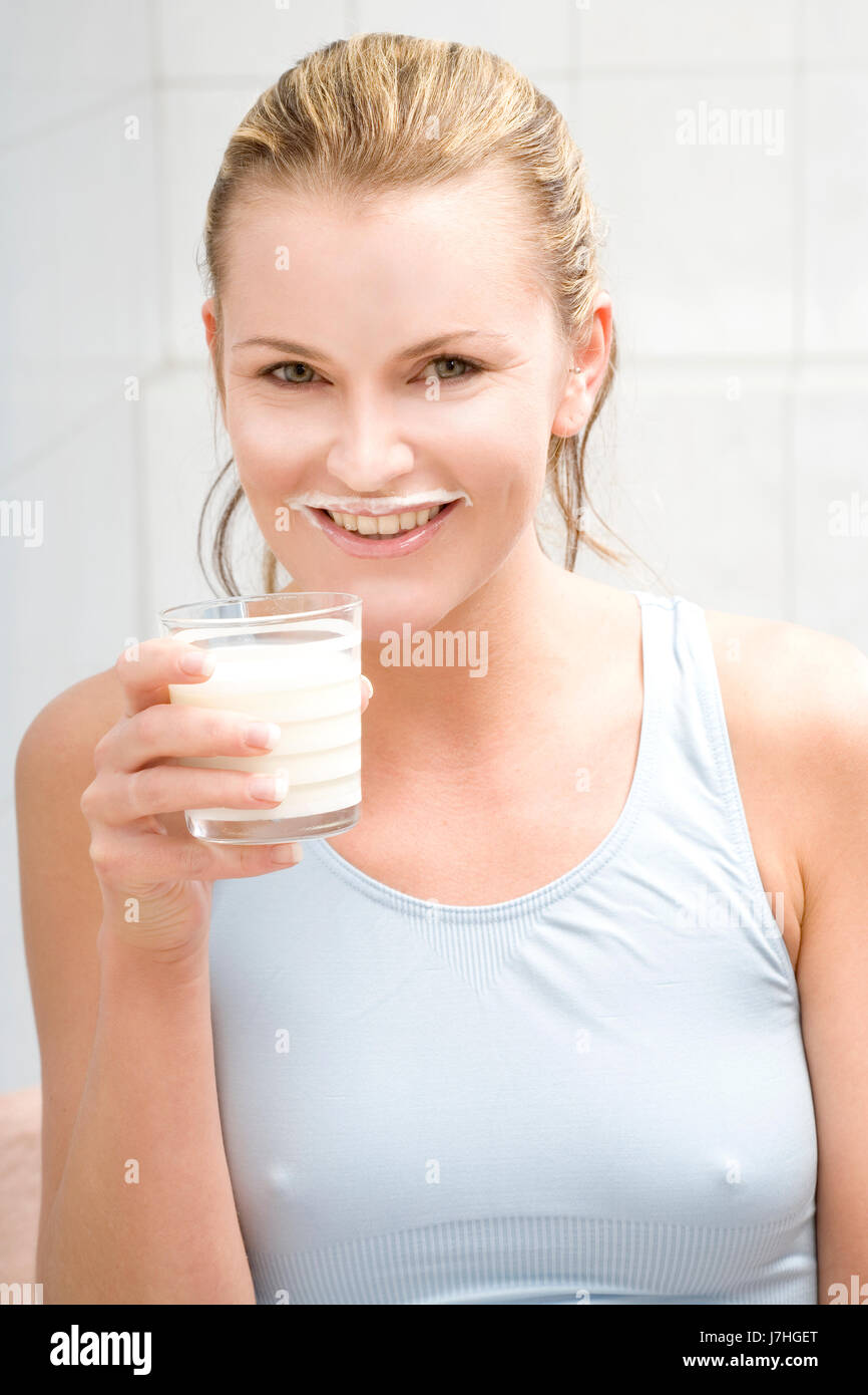 woman drinking milk Stock Photo - Alamy