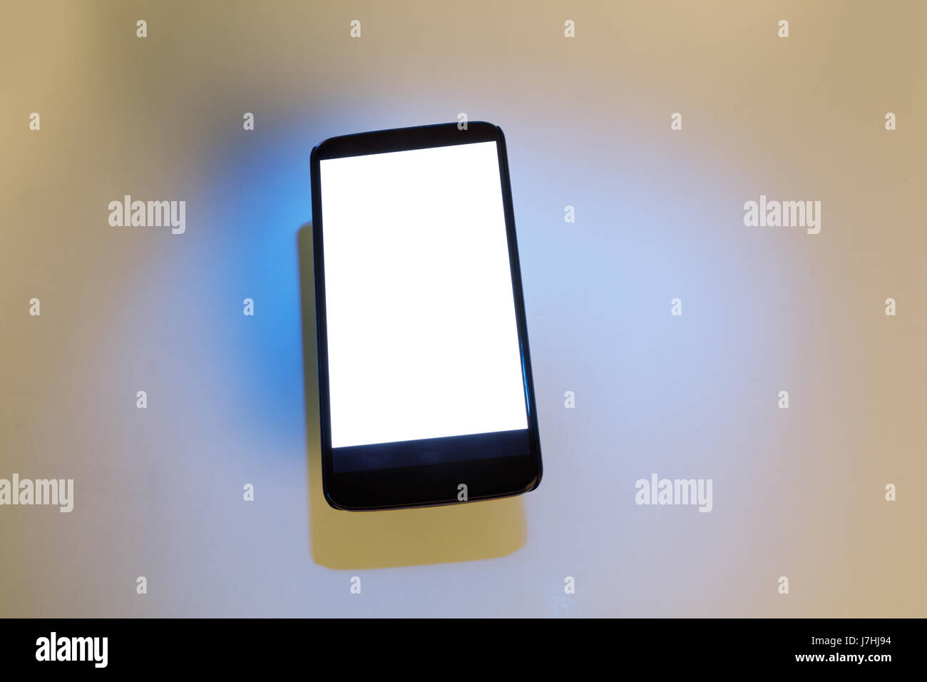 cellphone and shadow with blank screen. communication concept Stock ...