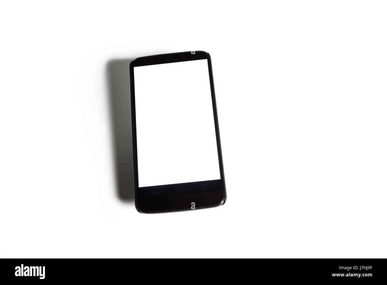 cellphone and shadow with blank screen. communication concept Stock ...