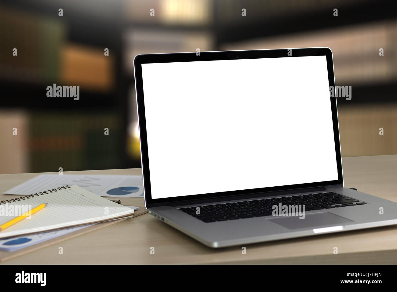 Laptop with blank screen on table. Workspace background new project on ...