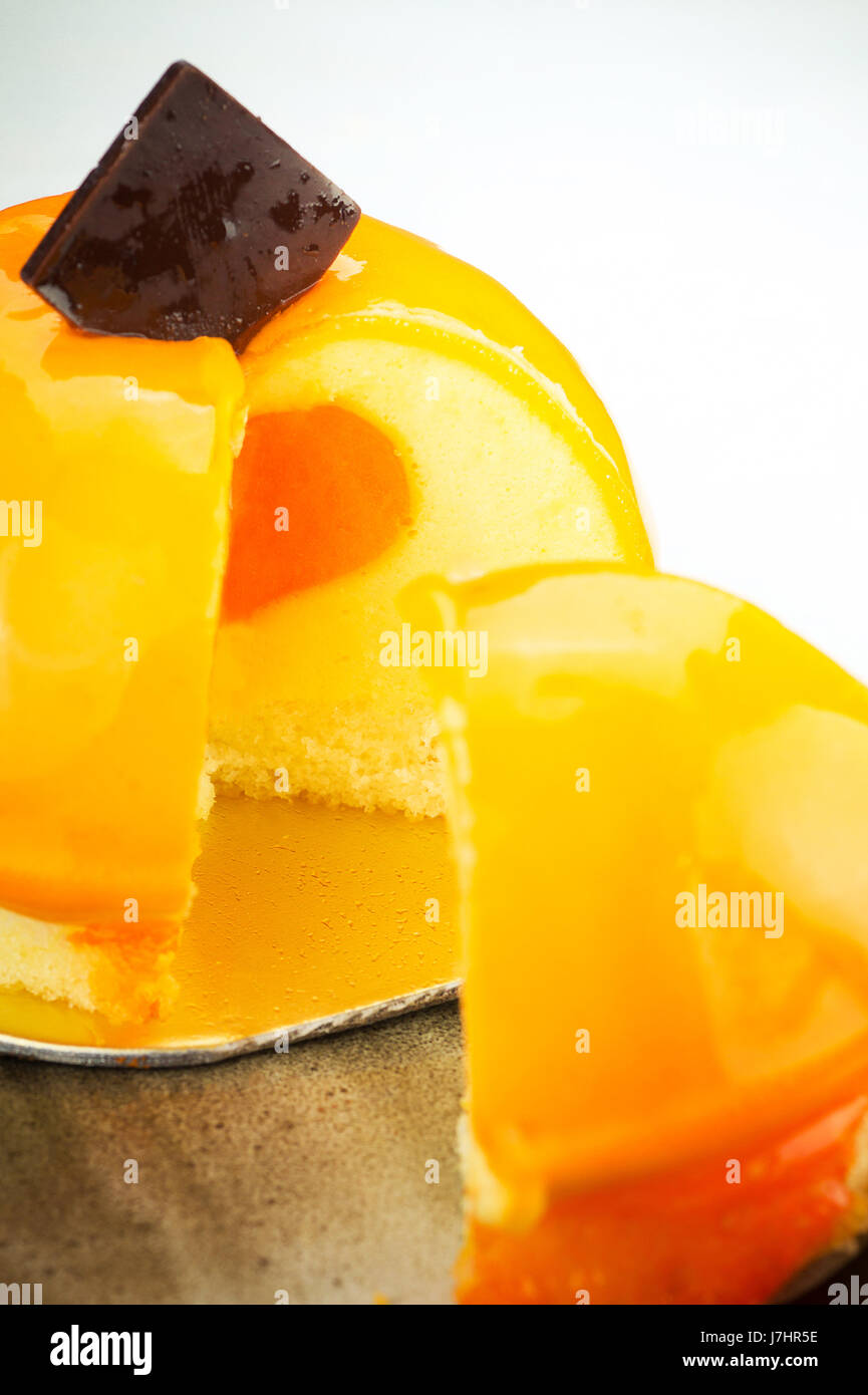 Stuffed orange cheesecake with chocolate Stock Photo - Alamy