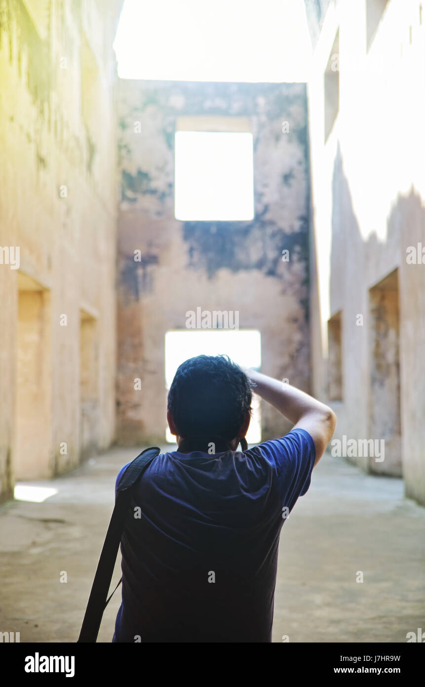 A tourist taking picture in the ruin of Pulo Cemeti, Taman Sari Water ...