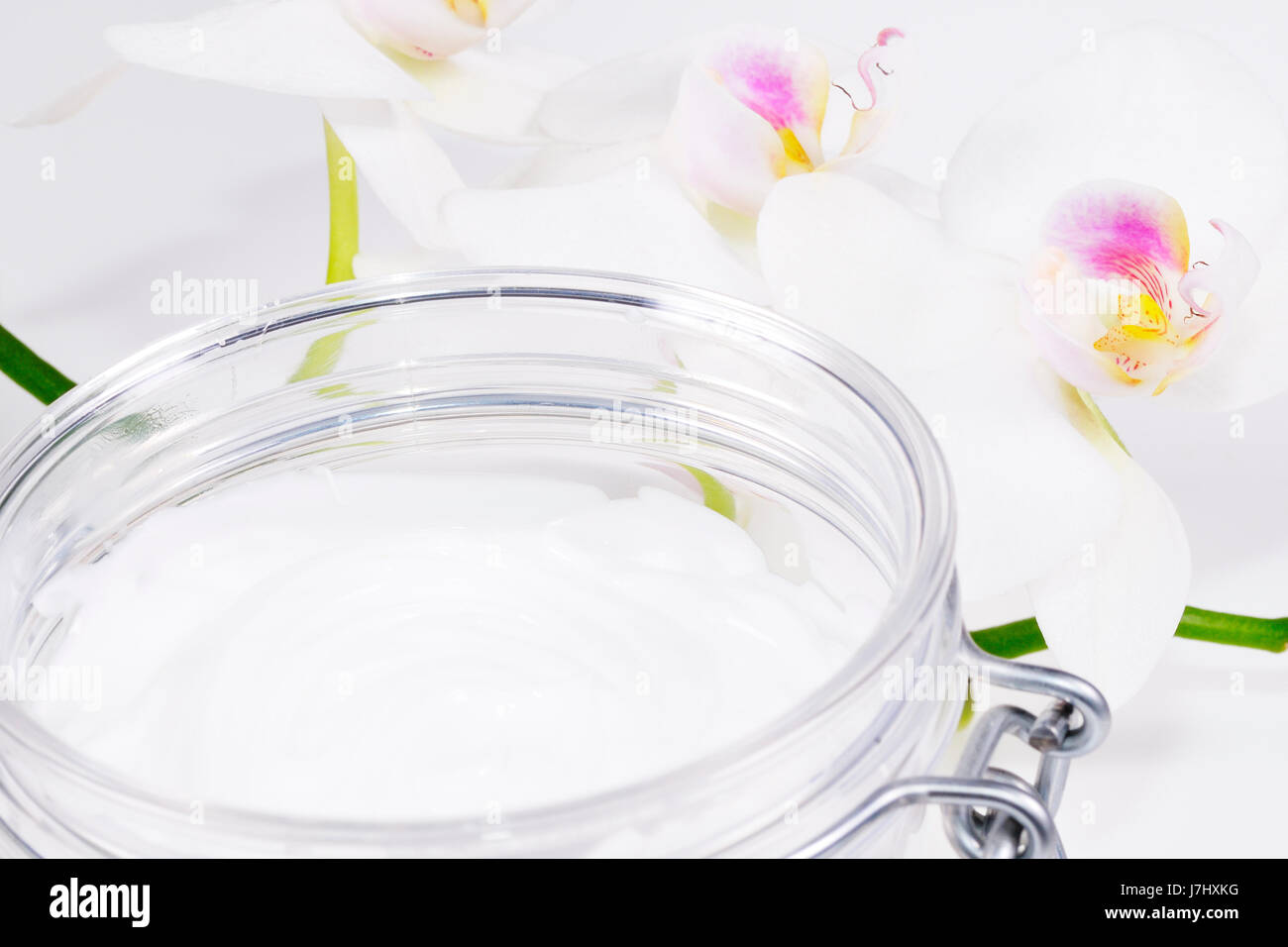body cream with orchid Stock Photo - Alamy