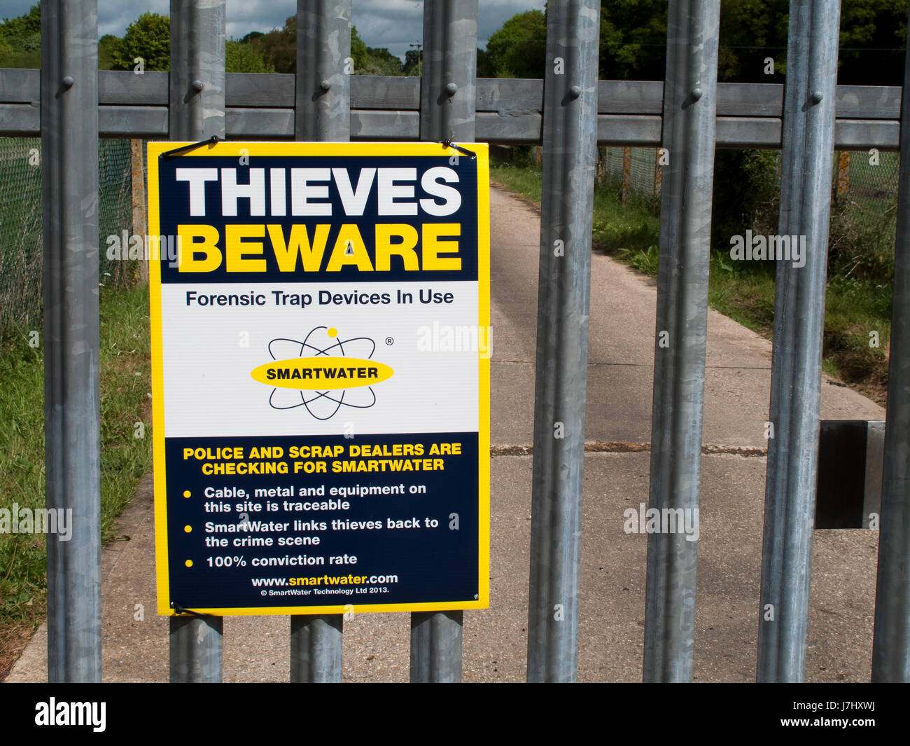 Smartwater Thieves beware forensic trap device in use sign on gate to ...