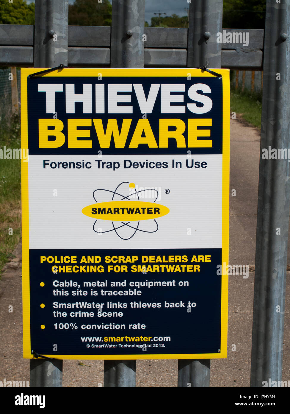 Smartwater Thieves beware forensic trap device in use sign on gate to ...
