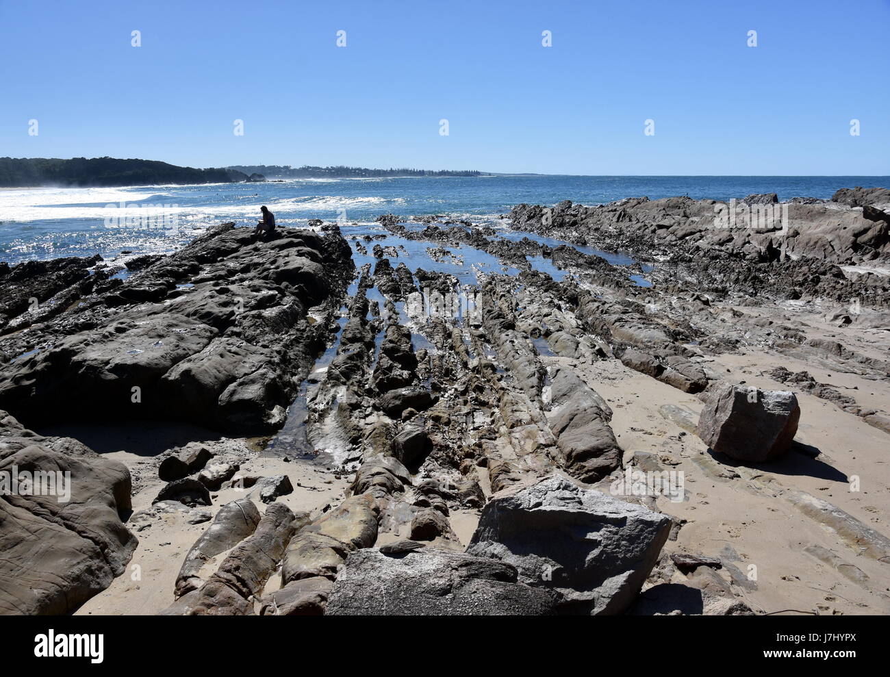 Rocks at Potato Point beach. Potato Point is a village in the ...