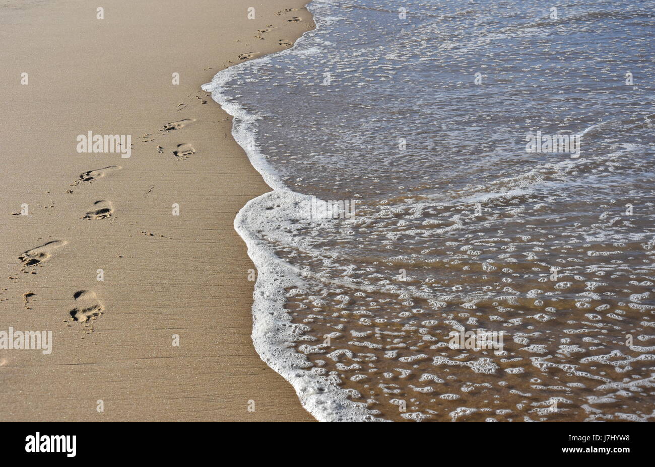 Wave and sand beach for background. Beautiful beach surface texture ...