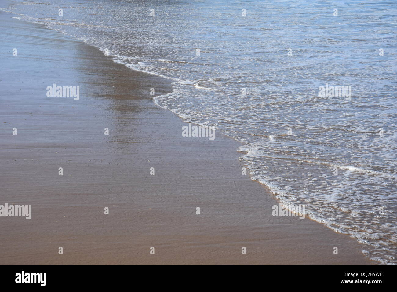 Wave and sand beach for background. Beautiful beach surface texture ...