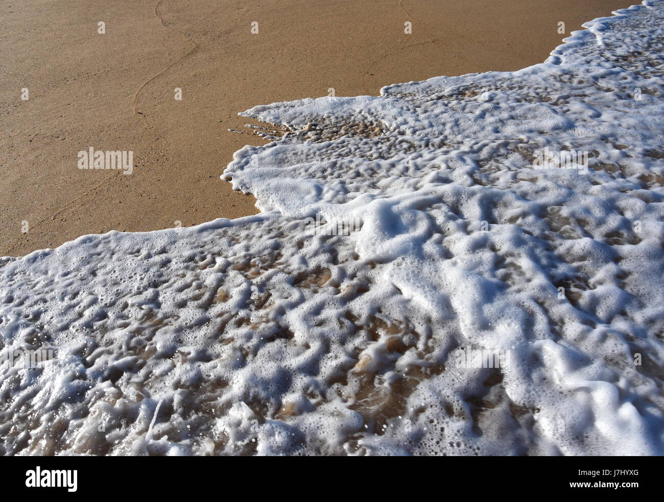Wave and sand beach for background. Beautiful beach surface texture ...