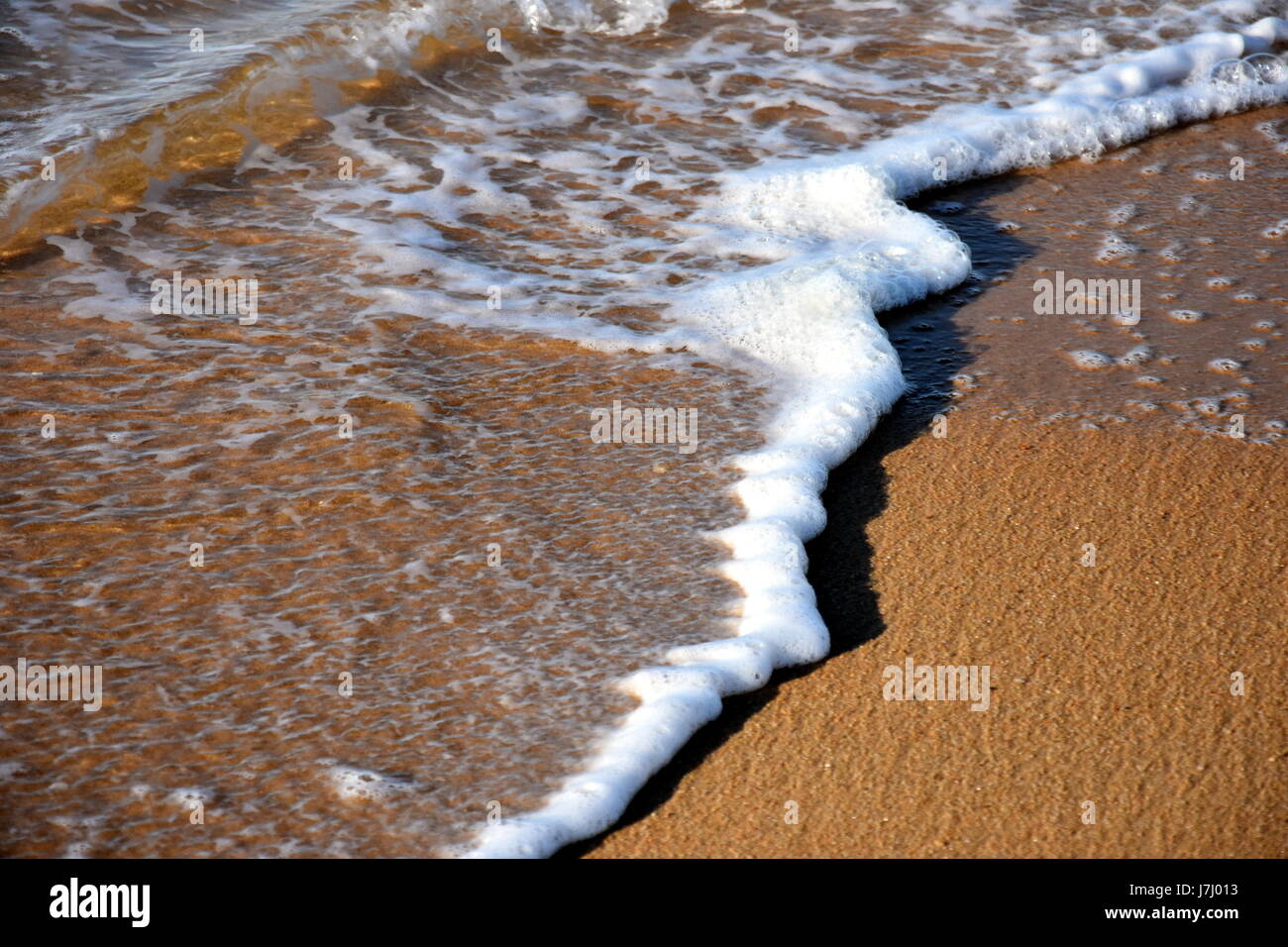 Wave and sand beach for background. Beautiful beach surface texture ...