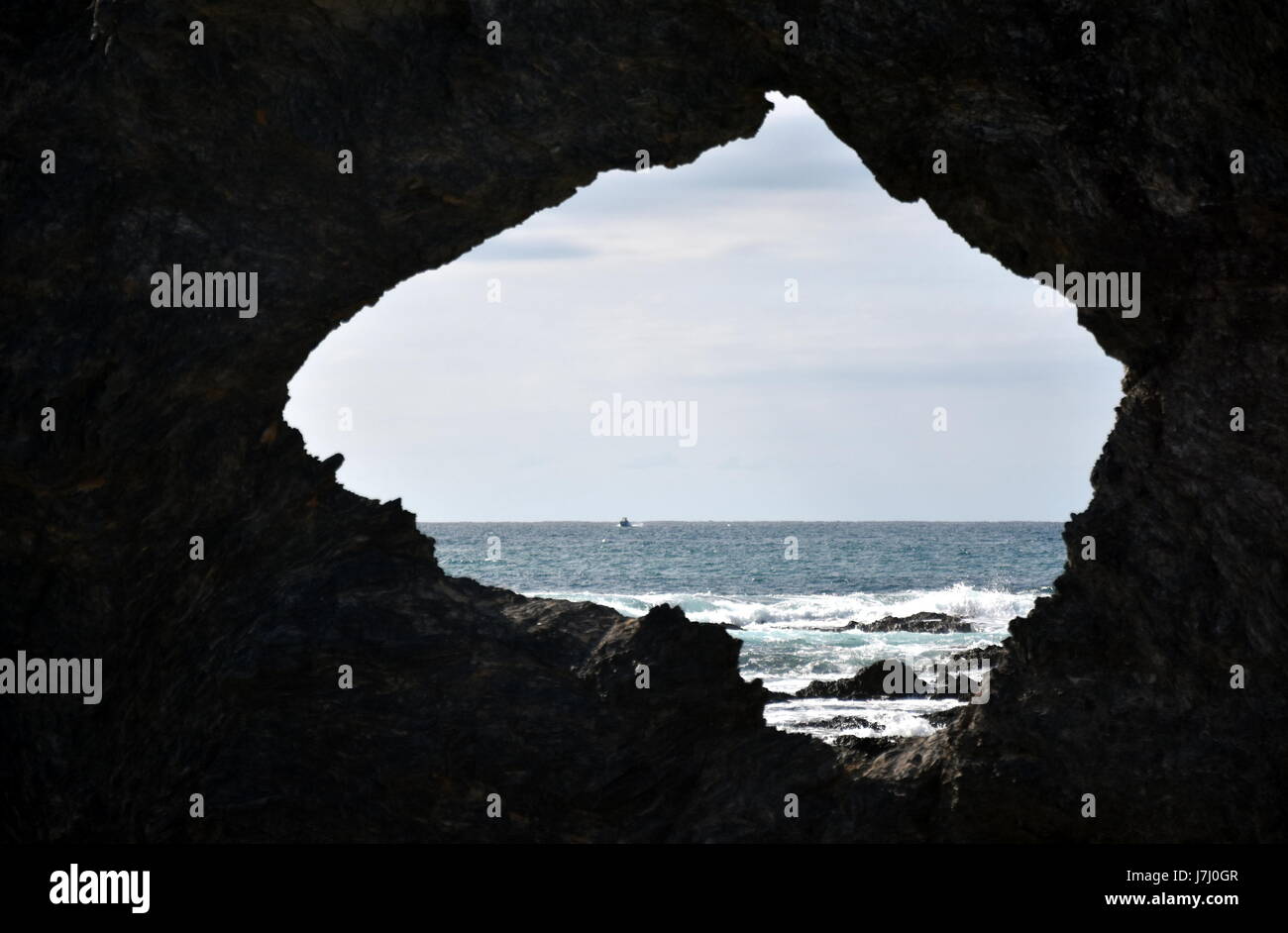 Australia rock and ocean in Narooma. The shape of Australia cut into ...