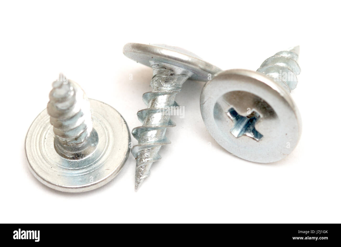 short screws isolated on white background Stock Photo - Alamy