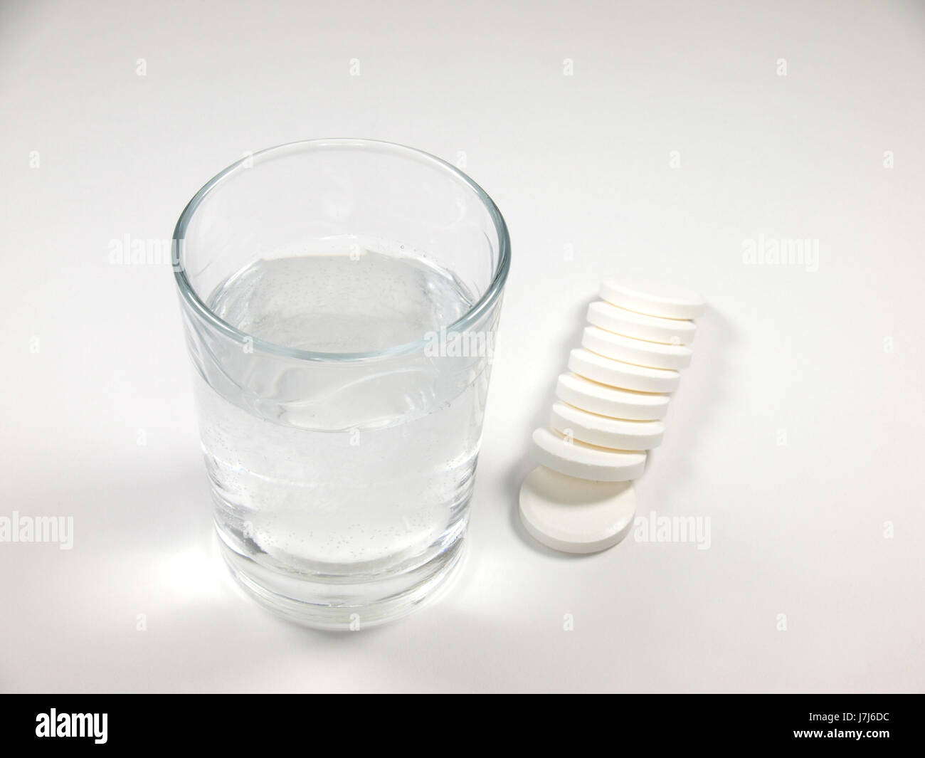 glass of water and tablets Stock Photo - Alamy