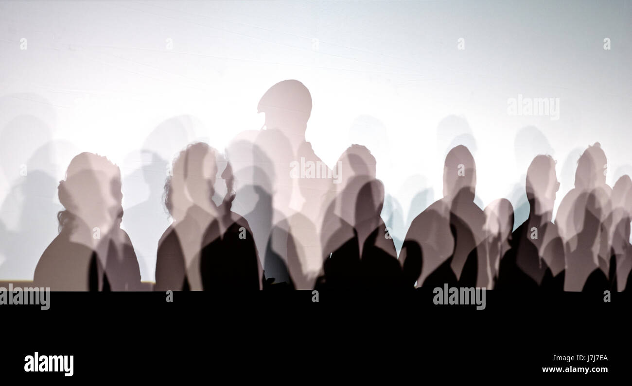 Lot of people shadows on white wall Stock Photo - Alamy