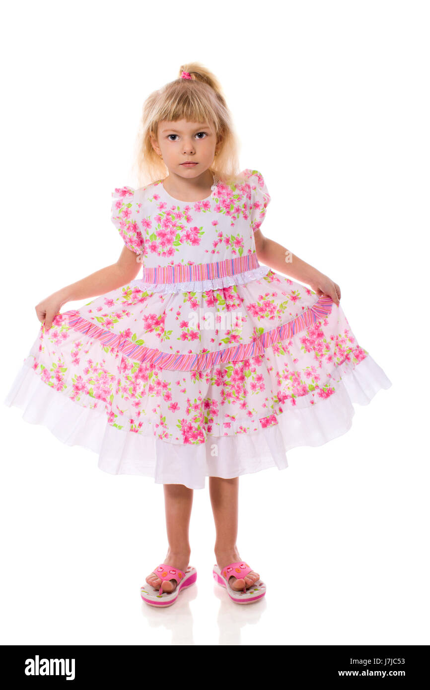 Cheerful girl wearing dress isolated on white Stock Photo - Alamy