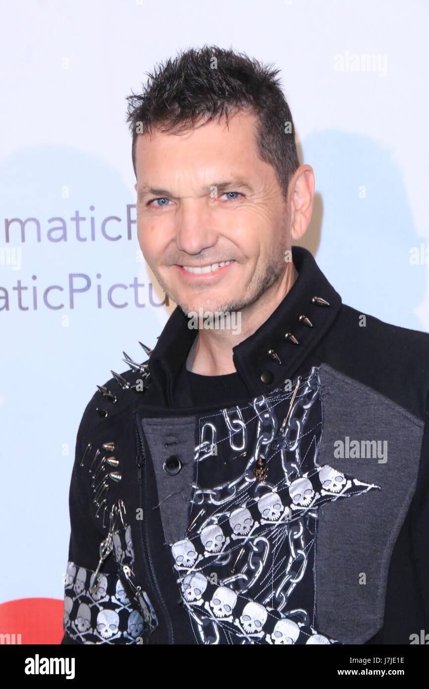 TJ Scott attending the book launch of Cinematic Pictures Publishing's ...