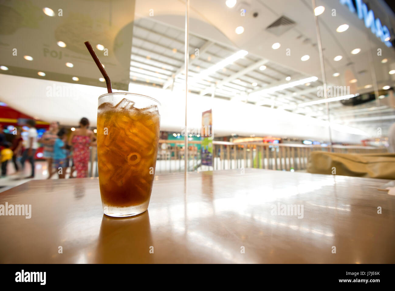iced lemon tea on the table in shopping mall Stock Photo - Alamy