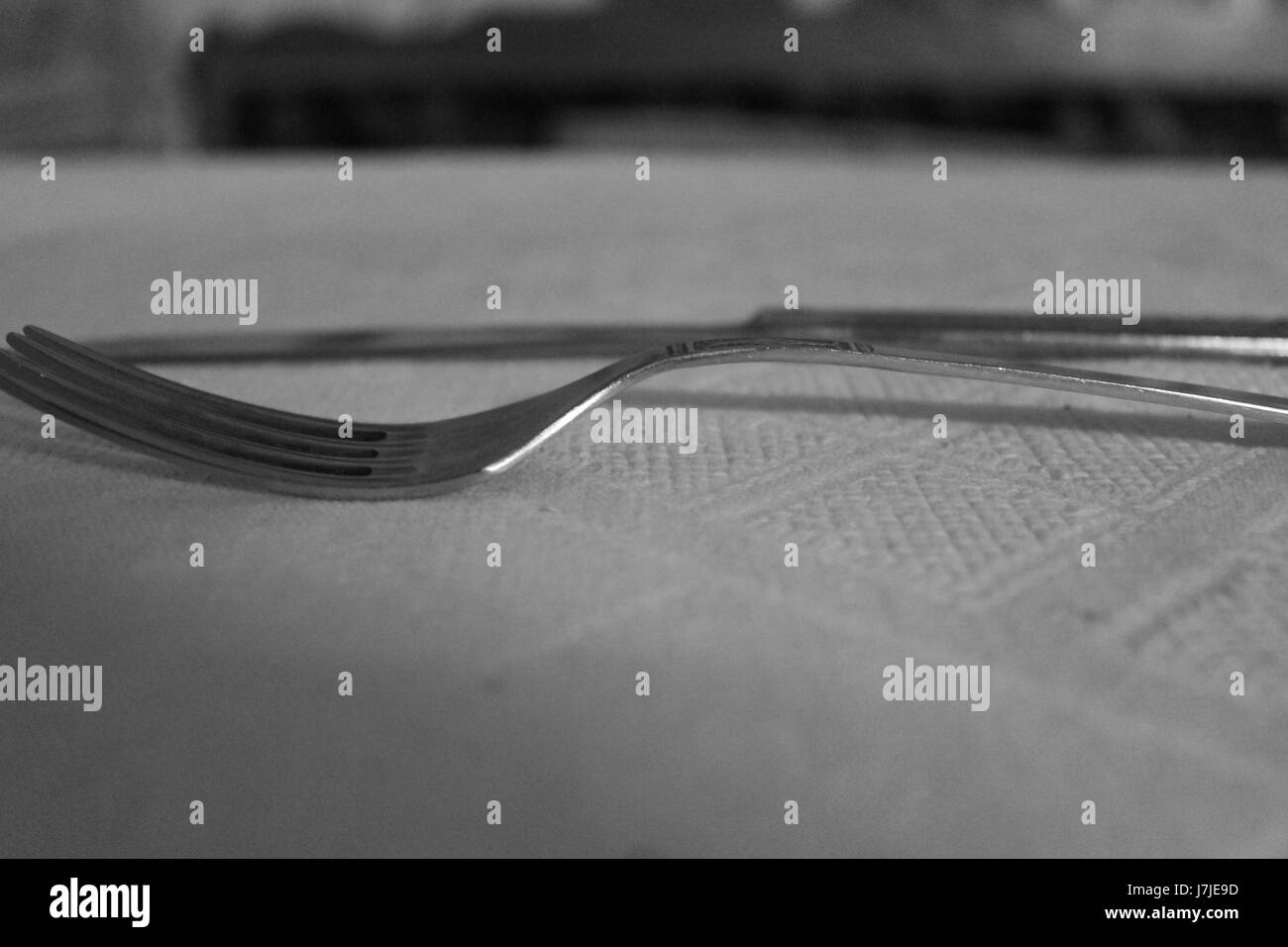 steel old retro style fork lay on the table Stock Photo - Alamy