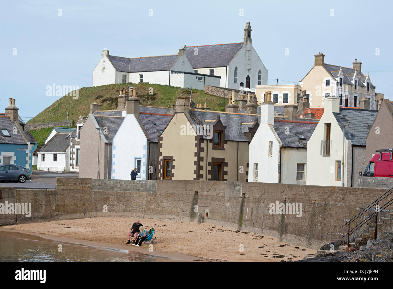 Findochty harbour with the town and Church beyond Stock Photo - Alamy