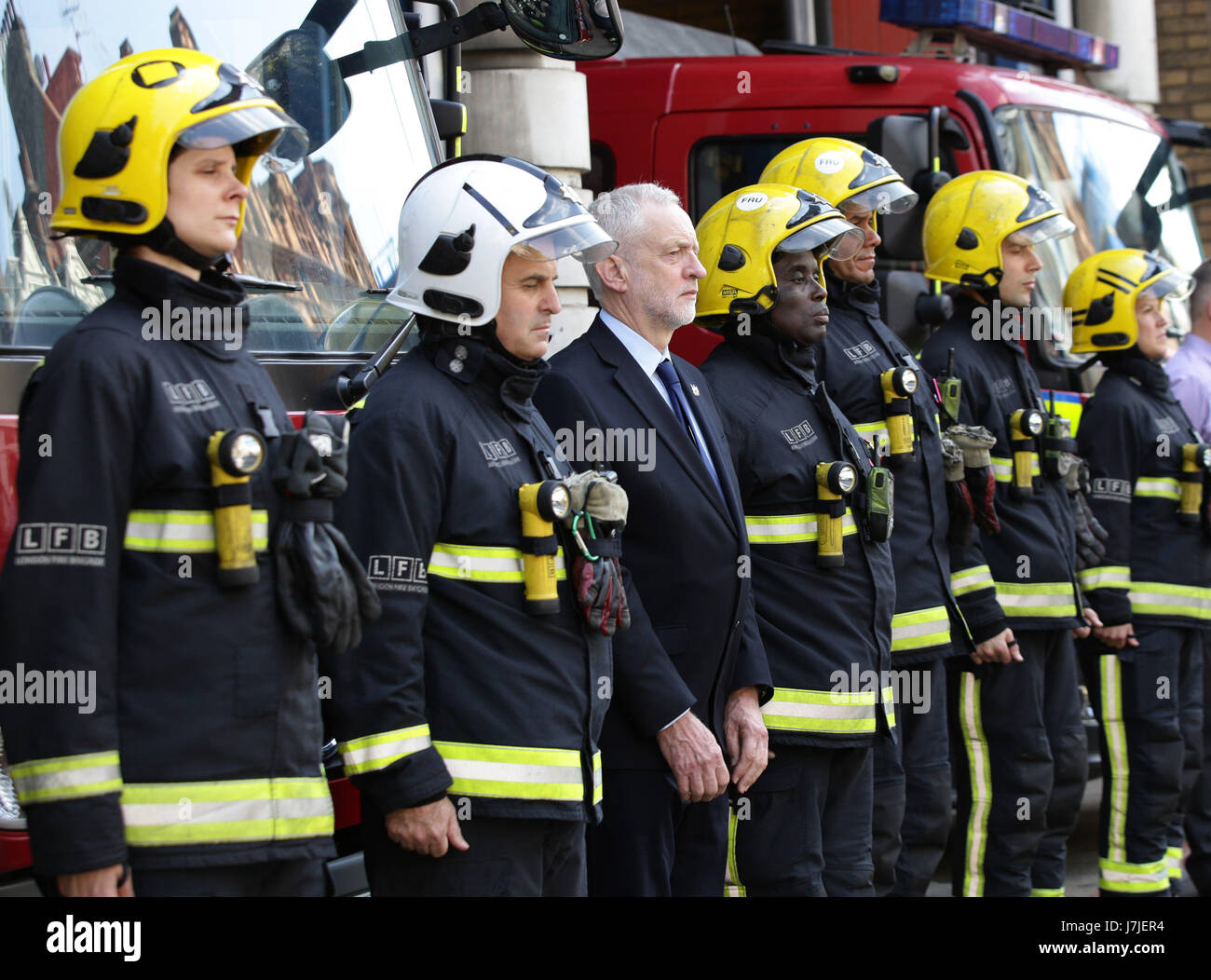 Labour leader Jeremy Corbyn (third left) joins fire fighters at ...